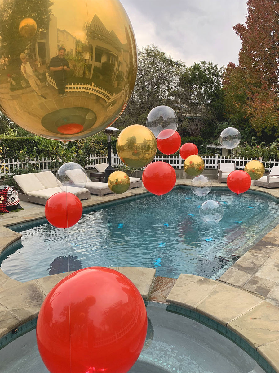 Balloons on the pool – Balloon Celebrations Inc